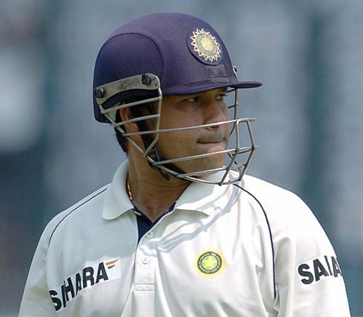 Sachin Tendulkar looks back while walking back to the pavilion ...