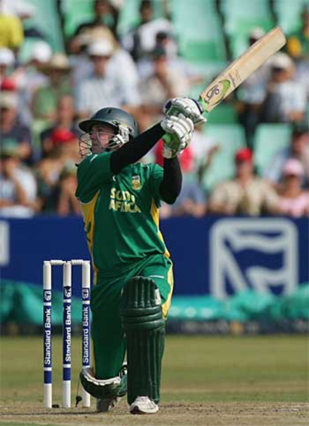 Aw, that's gonna hurt ... AB de Villiers is trapped by Mick Lewis ...