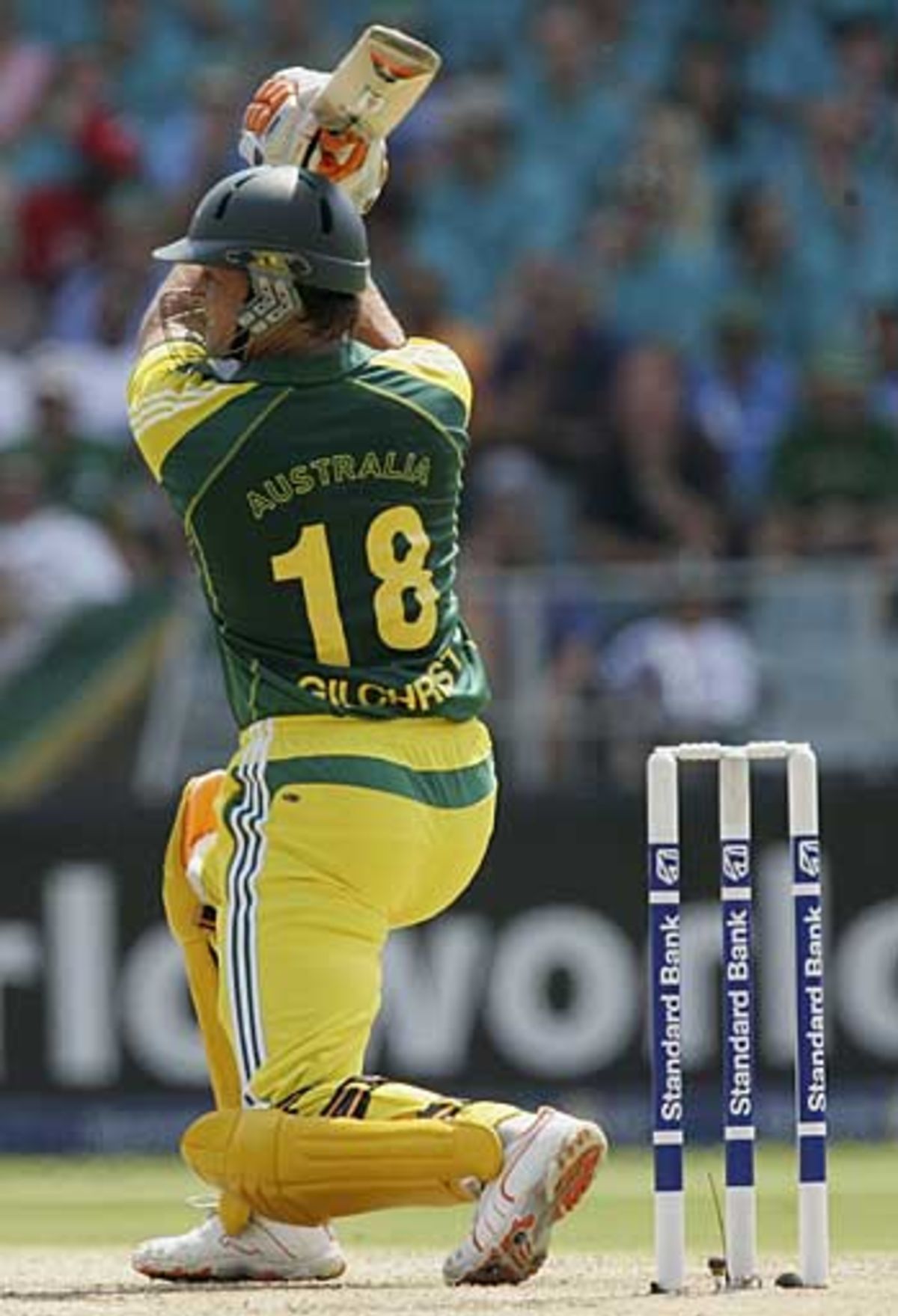 Adam Gilchrist greets the deep extra-cover boundary. Again ...
