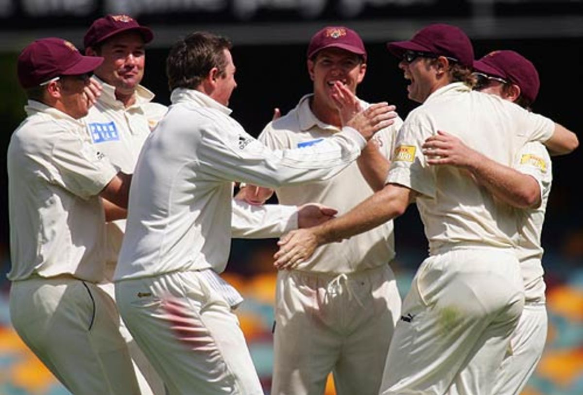 Queensland pose with the trophy | ESPNcricinfo.com