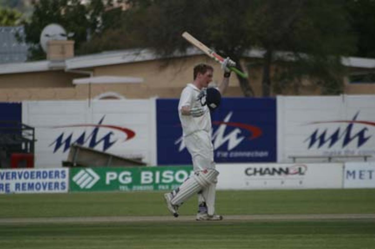 Ireland s Eion Morgan celebrates scoring a century in the semi-final ...