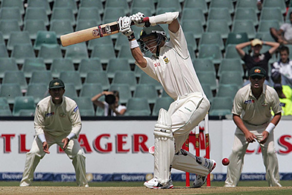 Stuart Clark stoops to stop the ball | ESPNcricinfo.com