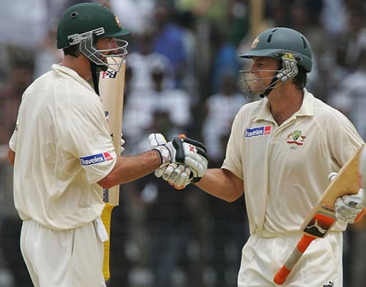 Jason Gillespie congratulates Adam Gilchrist after reaching his ton ...