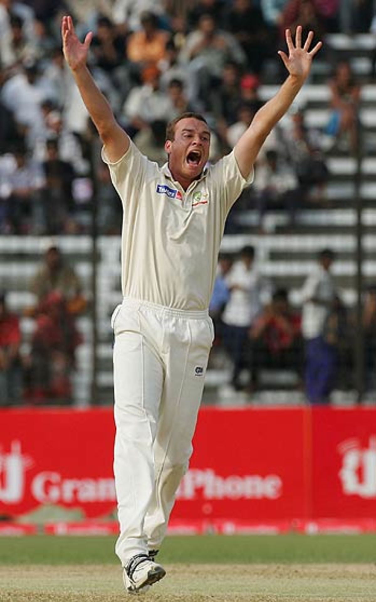 Simon Jones is presented with the Wisden Cricketer of the Year award by his father, Jeff Jones ...