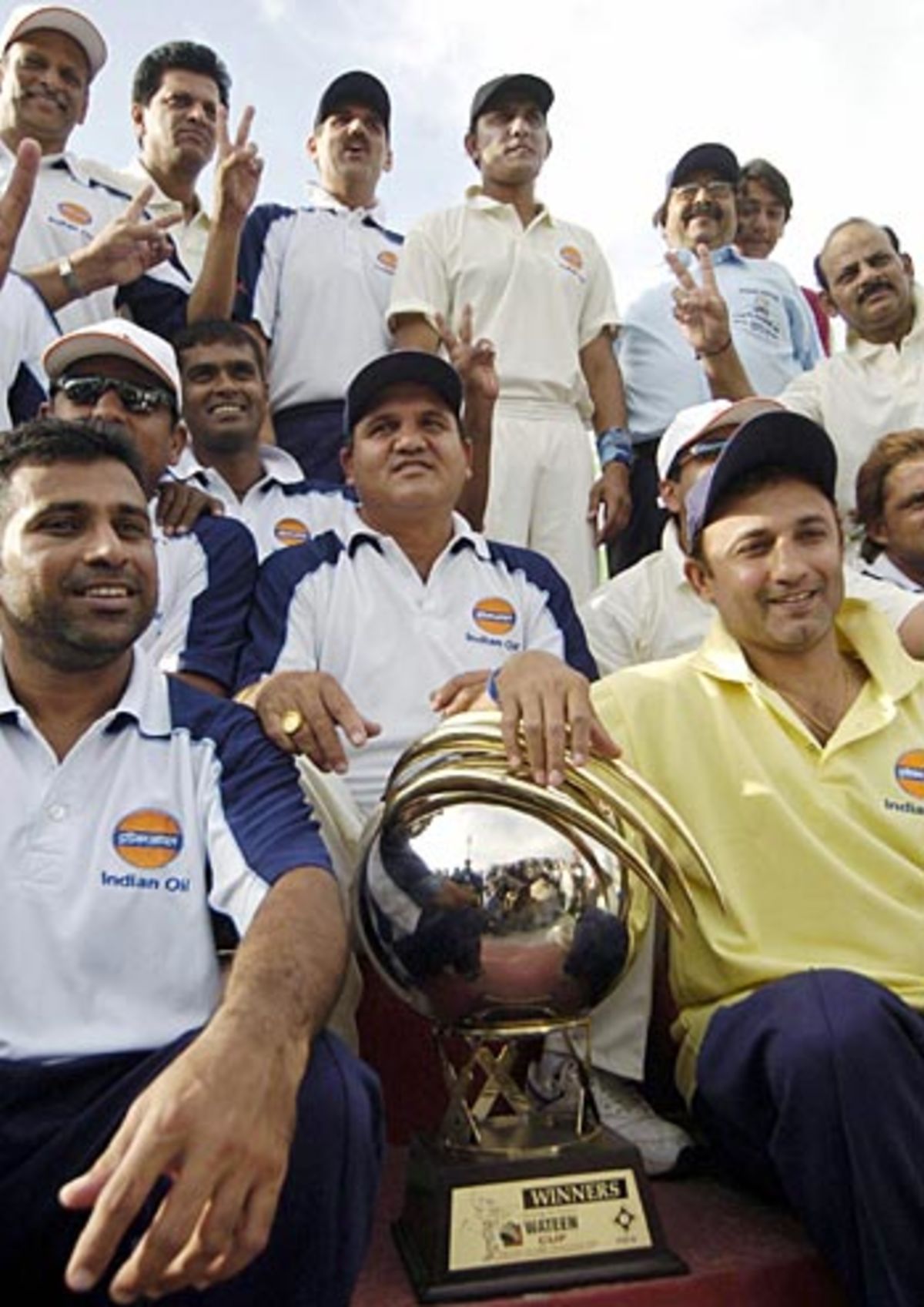 India's players celebrate with the winners' trophy after the fourth ...
