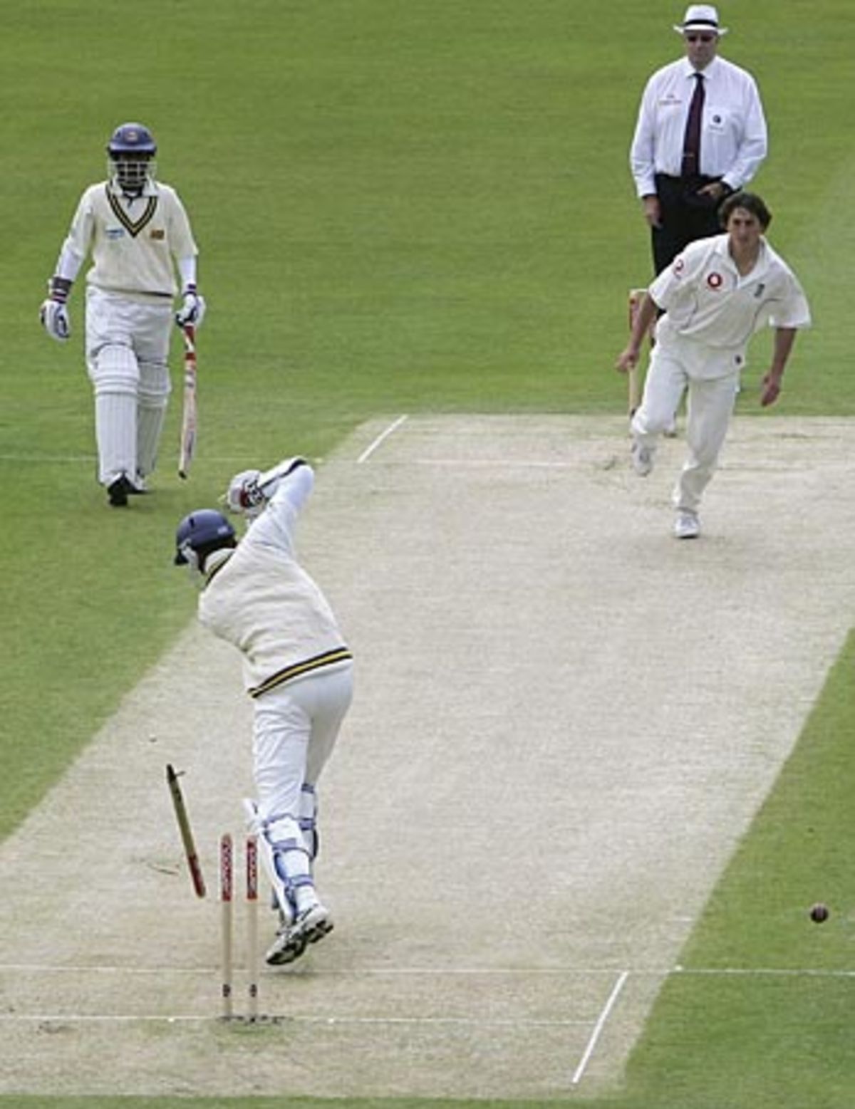 Jon Lewis bowls Michael Vandort with his third ball in Test cricket ...