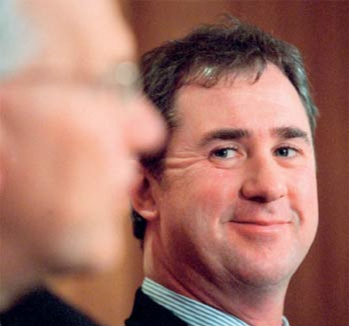 Tim May listens to Malcolm Speed | ESPNcricinfo.com