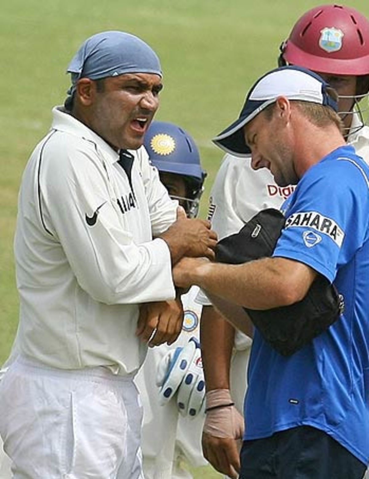 Corey Collymore and Brian Lara celebrate Virender Sehwag's wicket ...