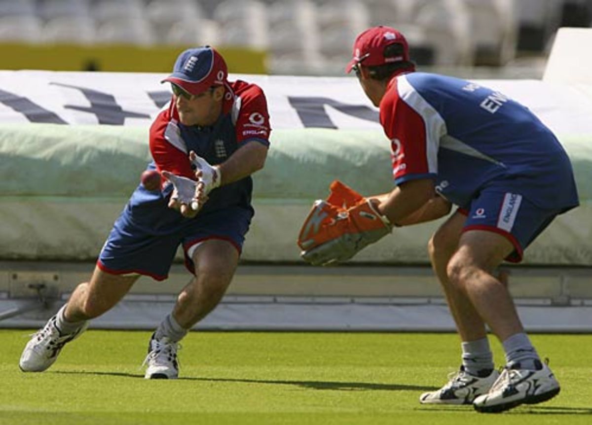 Practice makes perfect...hopefully. Strauss sharpens his catching ...