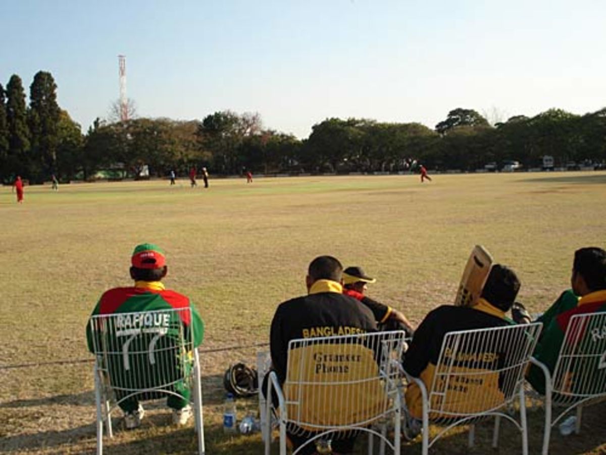 Bangladesh's players watch the closing overs | ESPNcricinfo.com