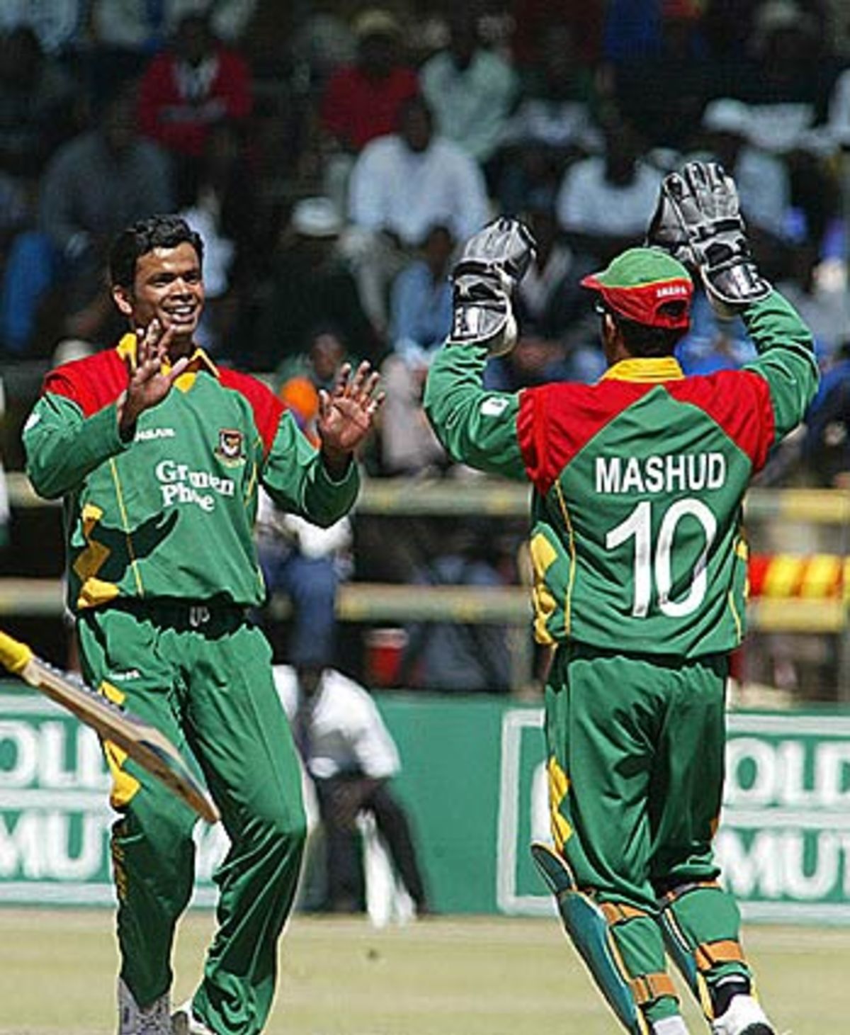 Abdur Razzak and Khaled Mashud celebrate a strike | ESPNcricinfo.com