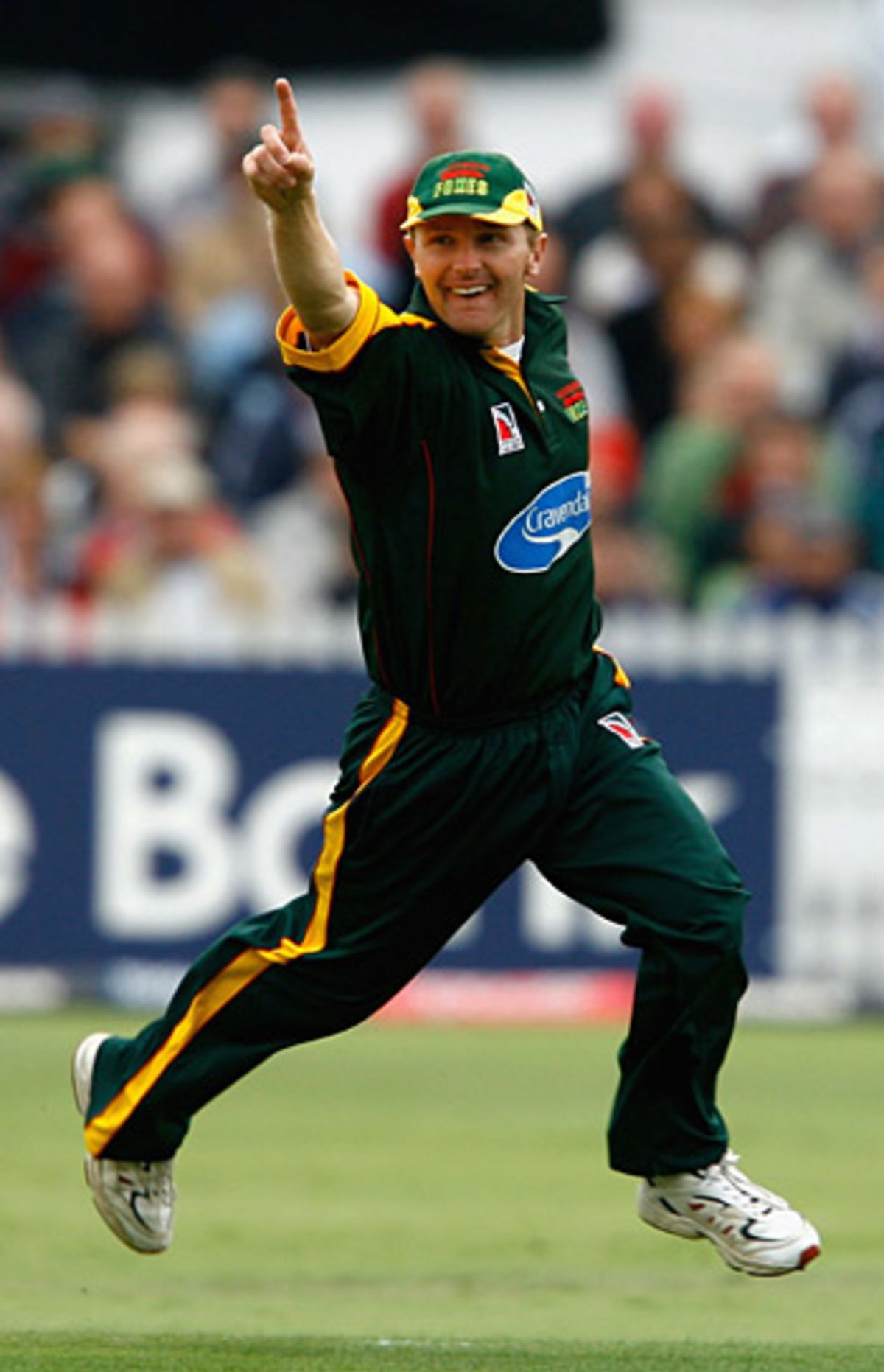 Darren Maddy celebrates his sharp piece of fielding to run out Alastair ...