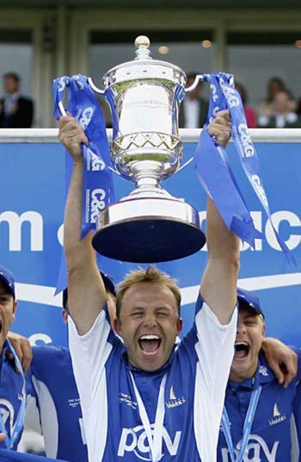 Chris Adams holds the C&G Trophy aloft | ESPNcricinfo.com