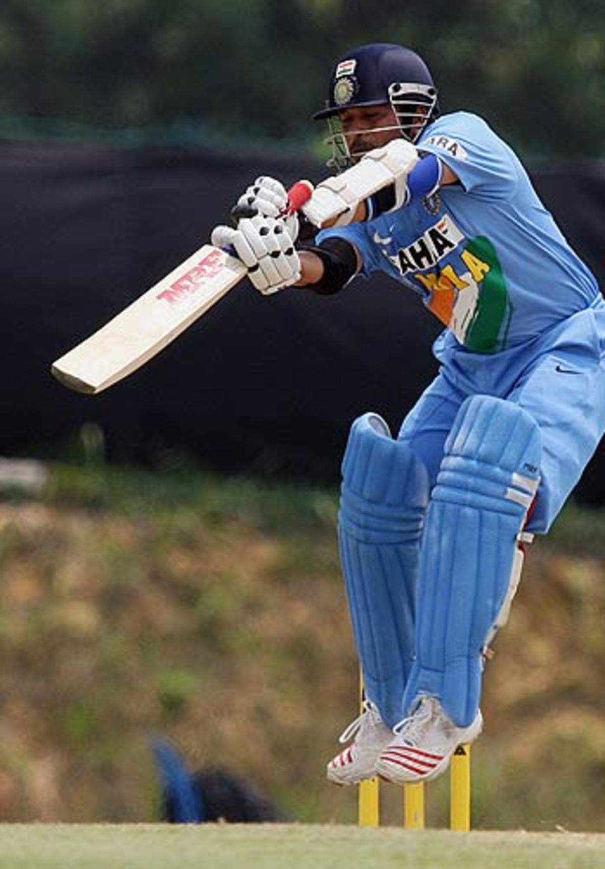 Sachin Tendulkar reaches out for one during his half-century | ESPNcricinfo.com