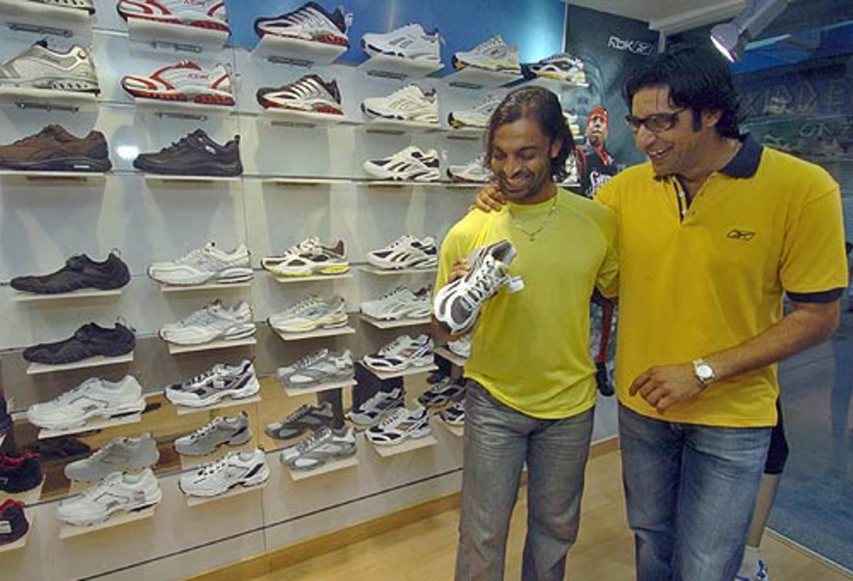 Shoaib Akhtar and Wasim Akram at the opening of Akram's shoe shop ...