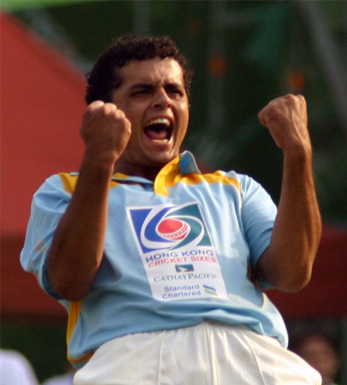India captain Robin Singh accepts the winners trophy from HKCA Chairman ...