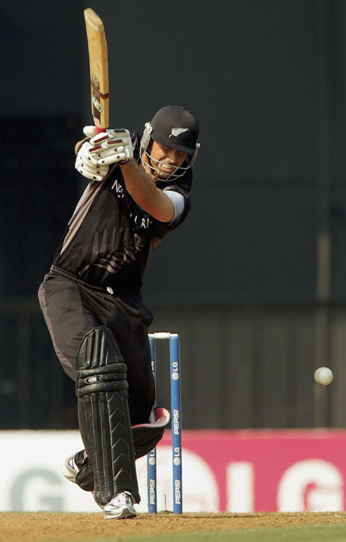Nathan Astle flicks off his pads | ESPNcricinfo.com