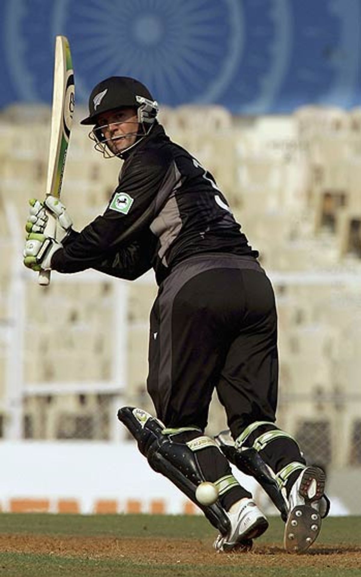 Nathan Astle flicks off his pads | ESPNcricinfo.com