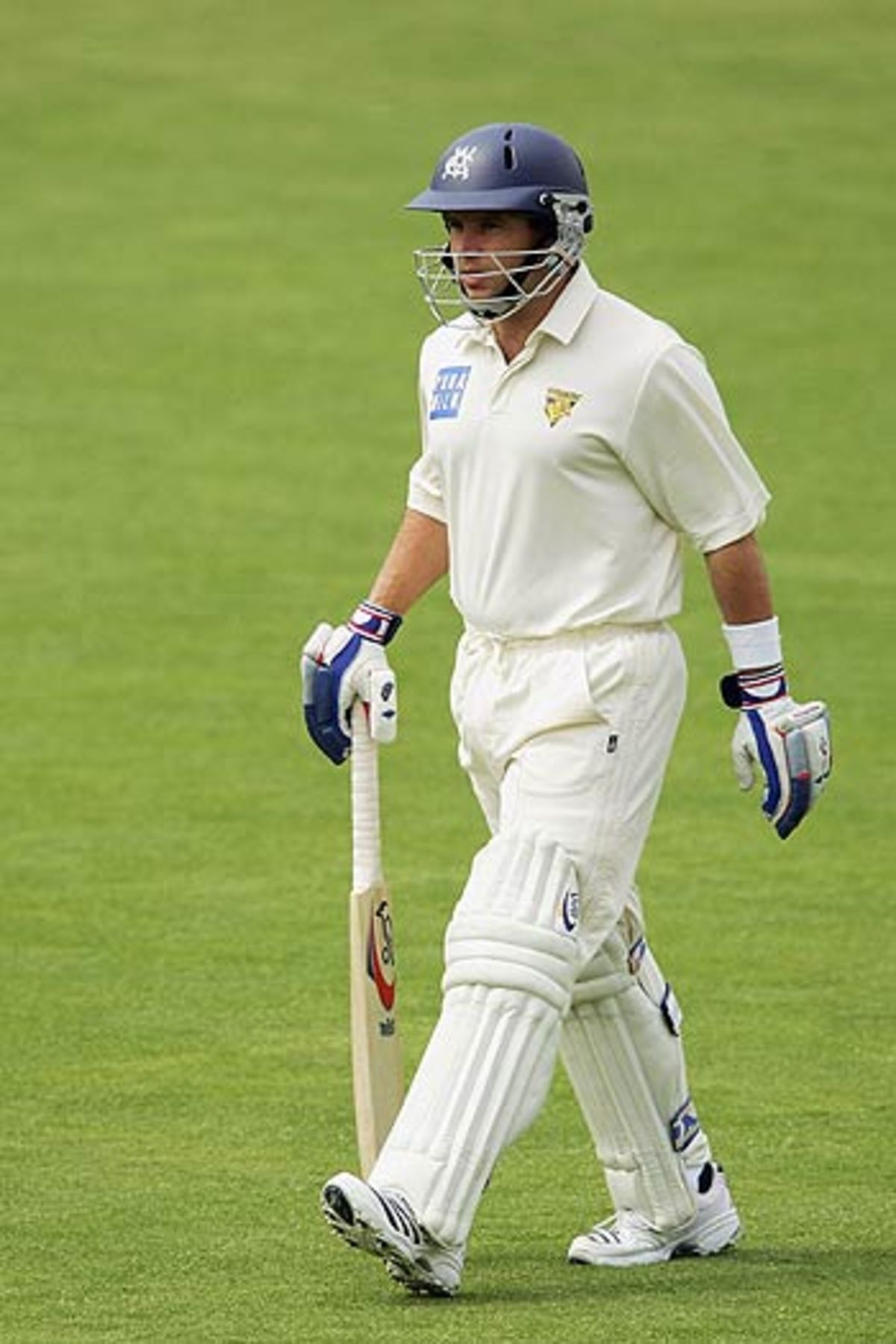 Brad Hodge walks back after scoring 18 | ESPNcricinfo.com