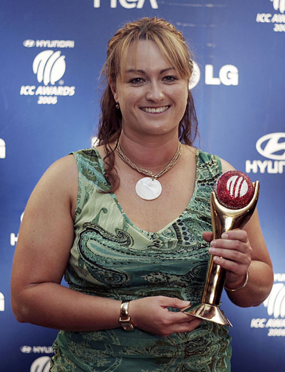 A delighted Karen Rolton beams with the inaugural Women's Player of the ...
