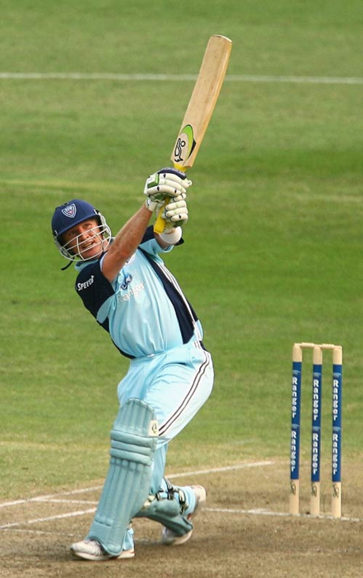 Brad Haddin swings over the leg side as he collects an 88-ball century ...