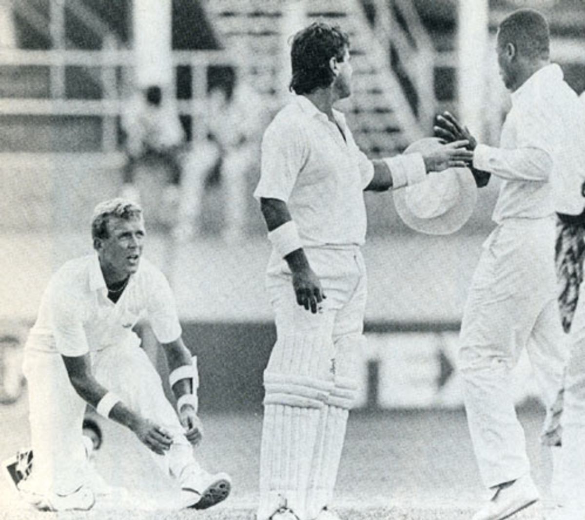 Allan Lamb steps between a rowing Alec Stewart and Desmond Haynes ...