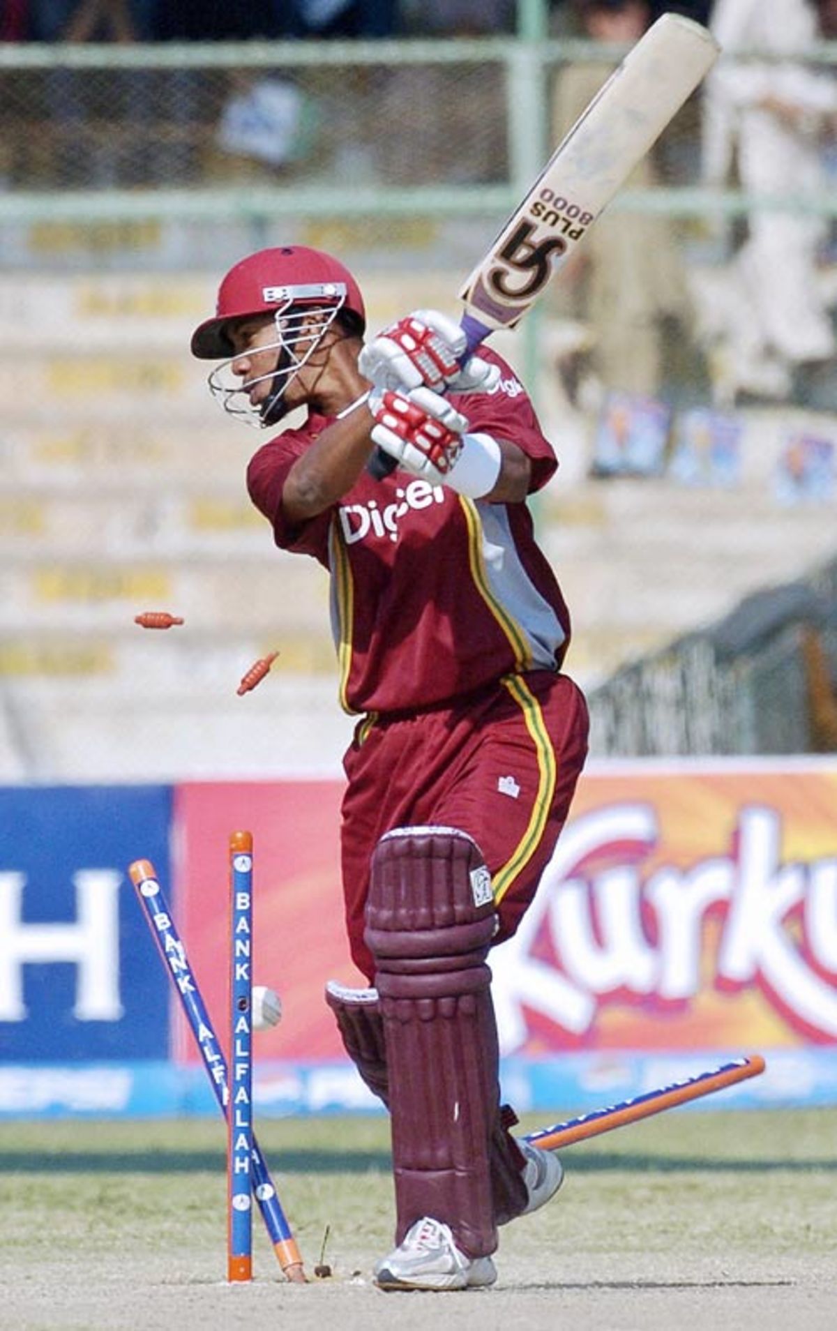 Lendl Simmons's stumps go for a walk as Mohammad Sami strikes ...
