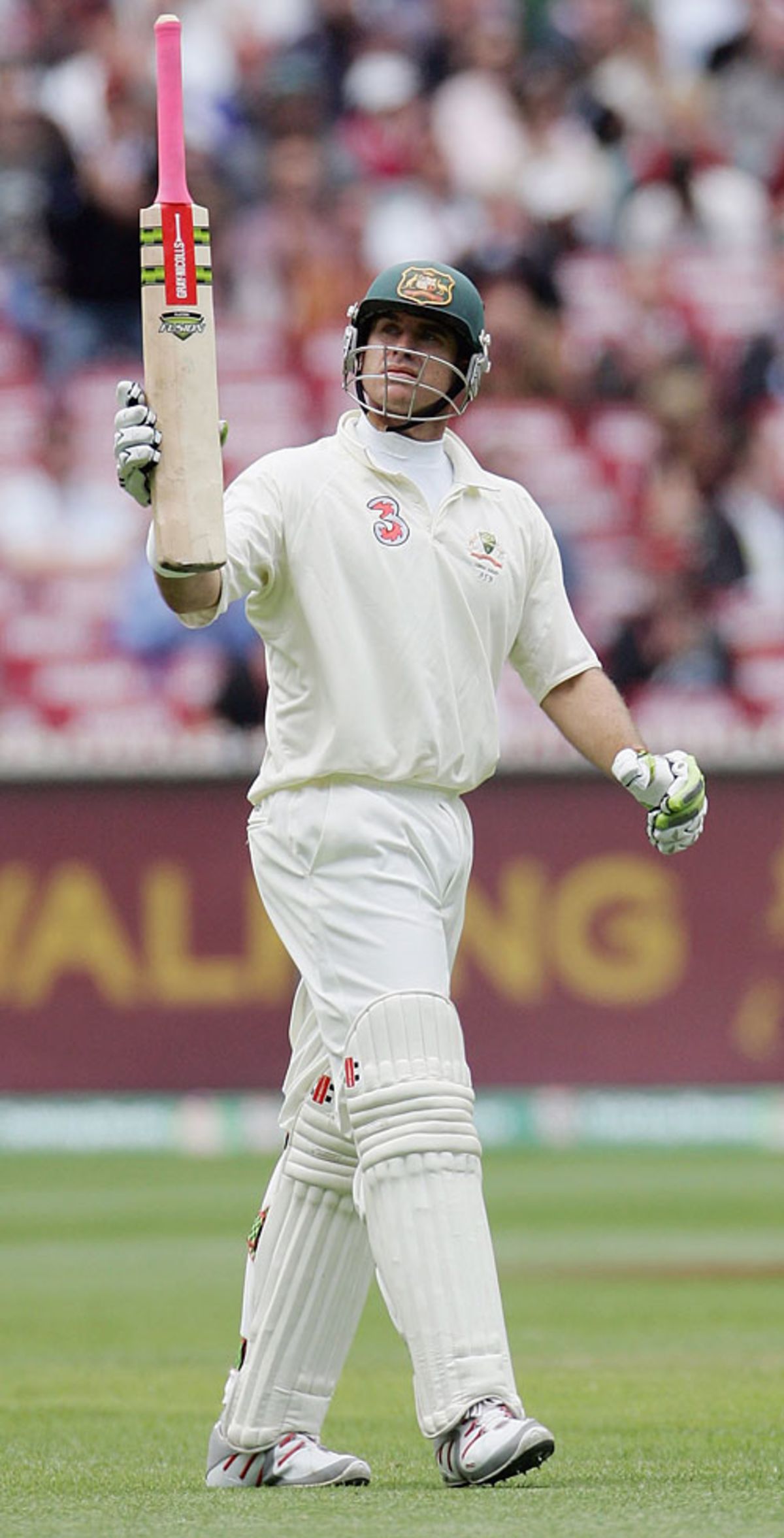 Matthew Hayden raises his bat on reaching fifty | ESPNcricinfo.com