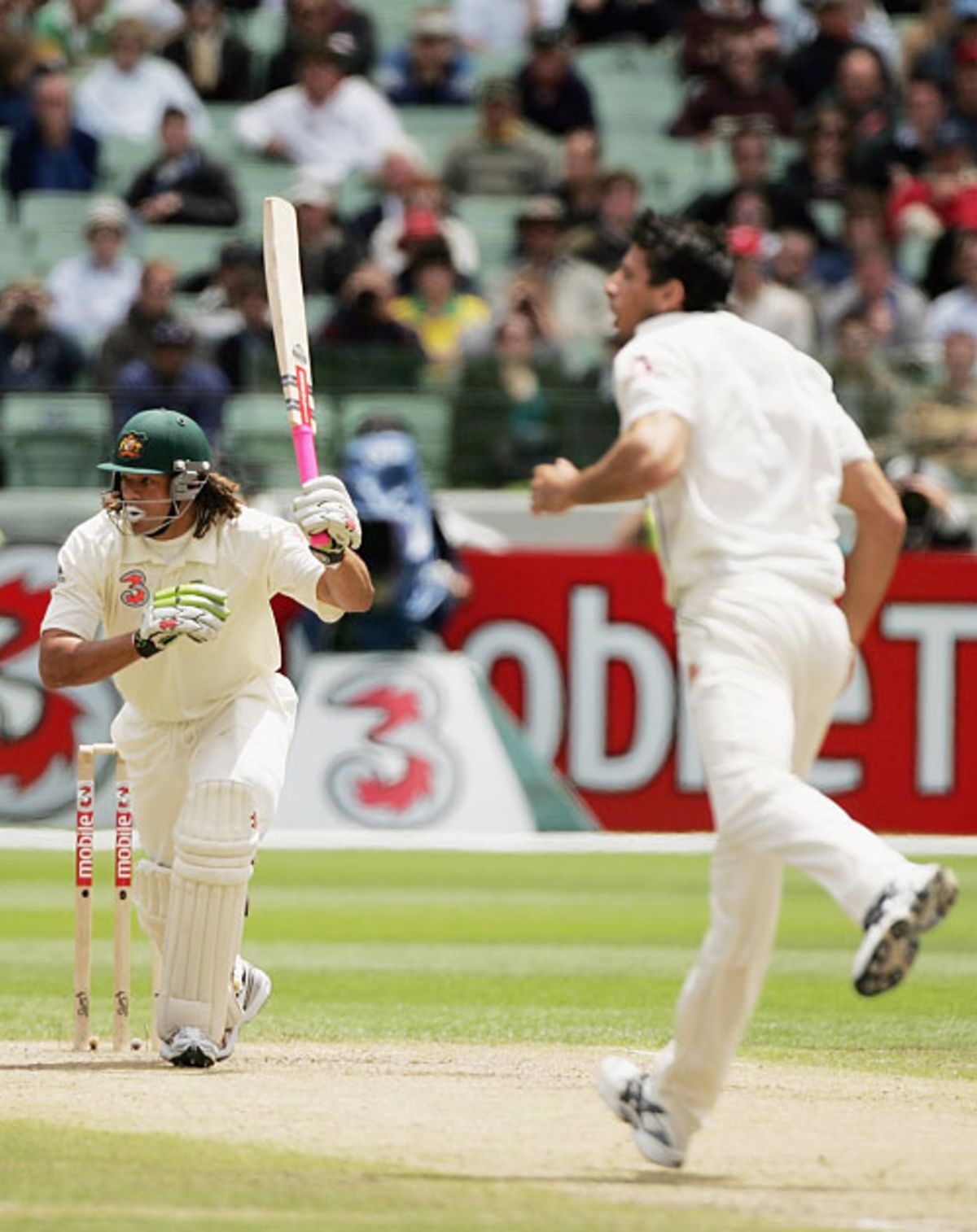 Matthew Hayden raises his bat on reaching fifty | ESPNcricinfo.com