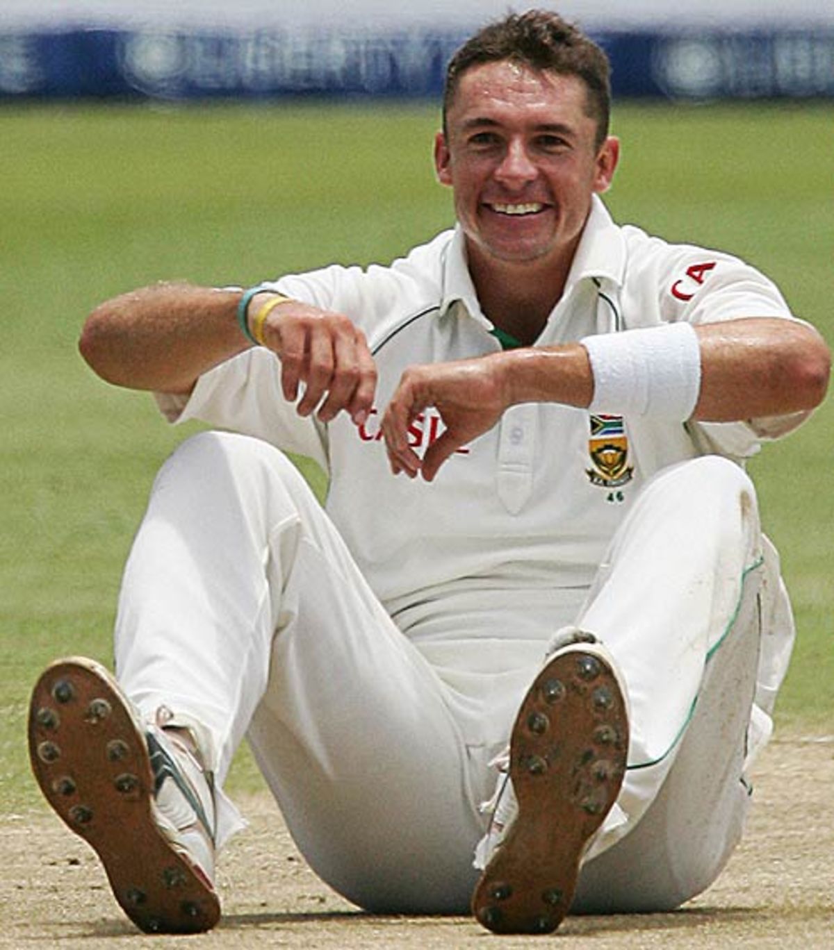 Andre Nel chuckles after falling over in his delivery stride ...