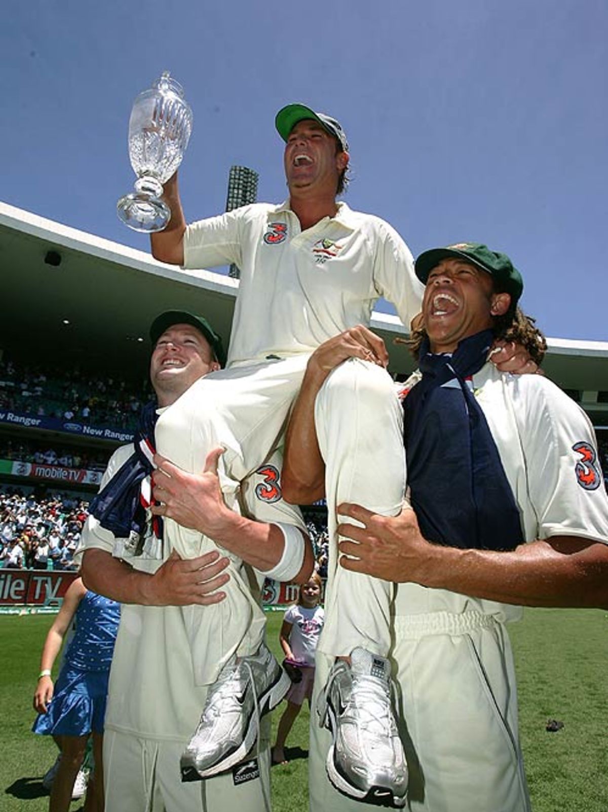 Michael Clarke and Andrew Symonds chair Shane Warne off the SCG in his ...
