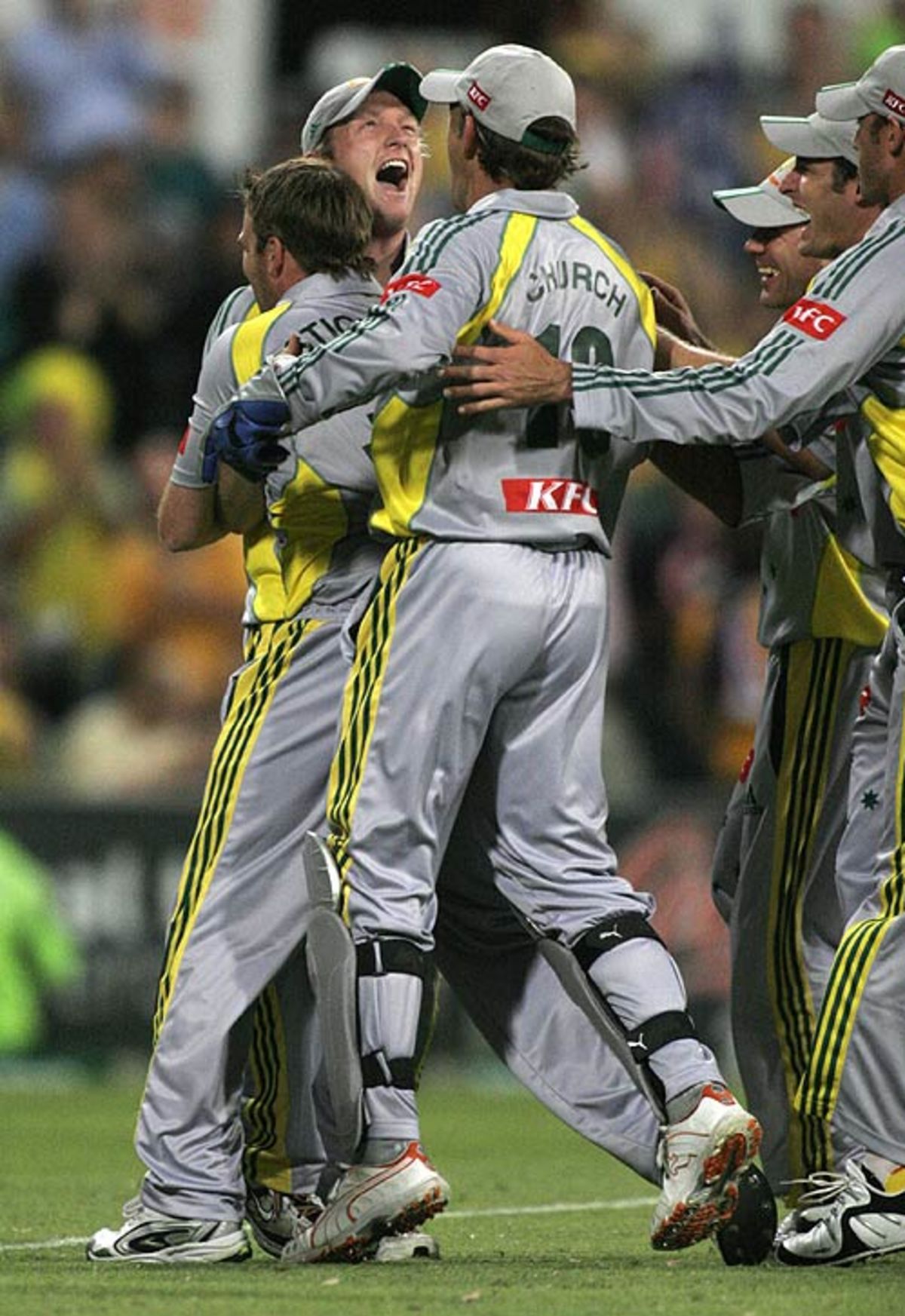 Shane Harwood thanks Cameron White for the catch that gave Harwood his ...