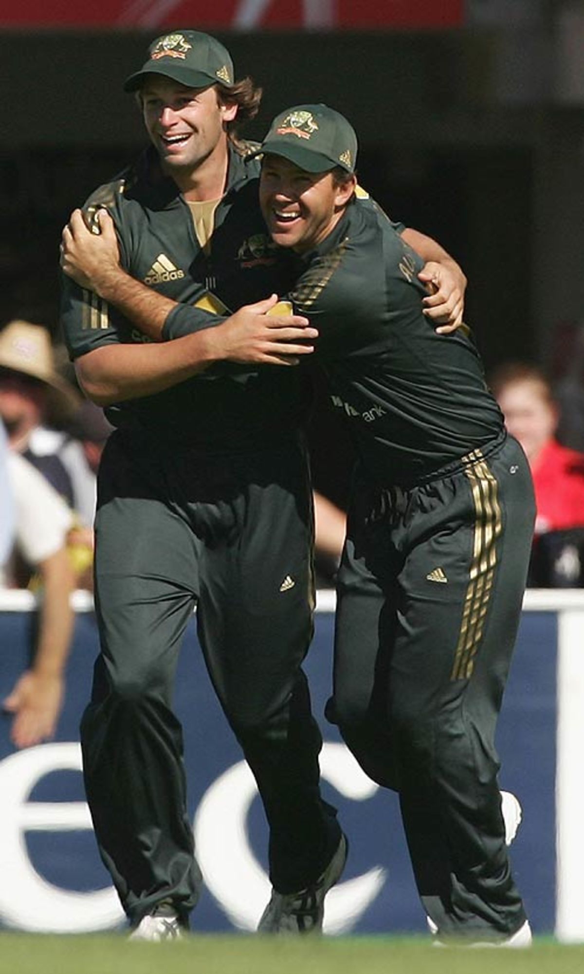 Ricky Ponting congratulates the debutant Ben Hilfenhaus on taking the ...