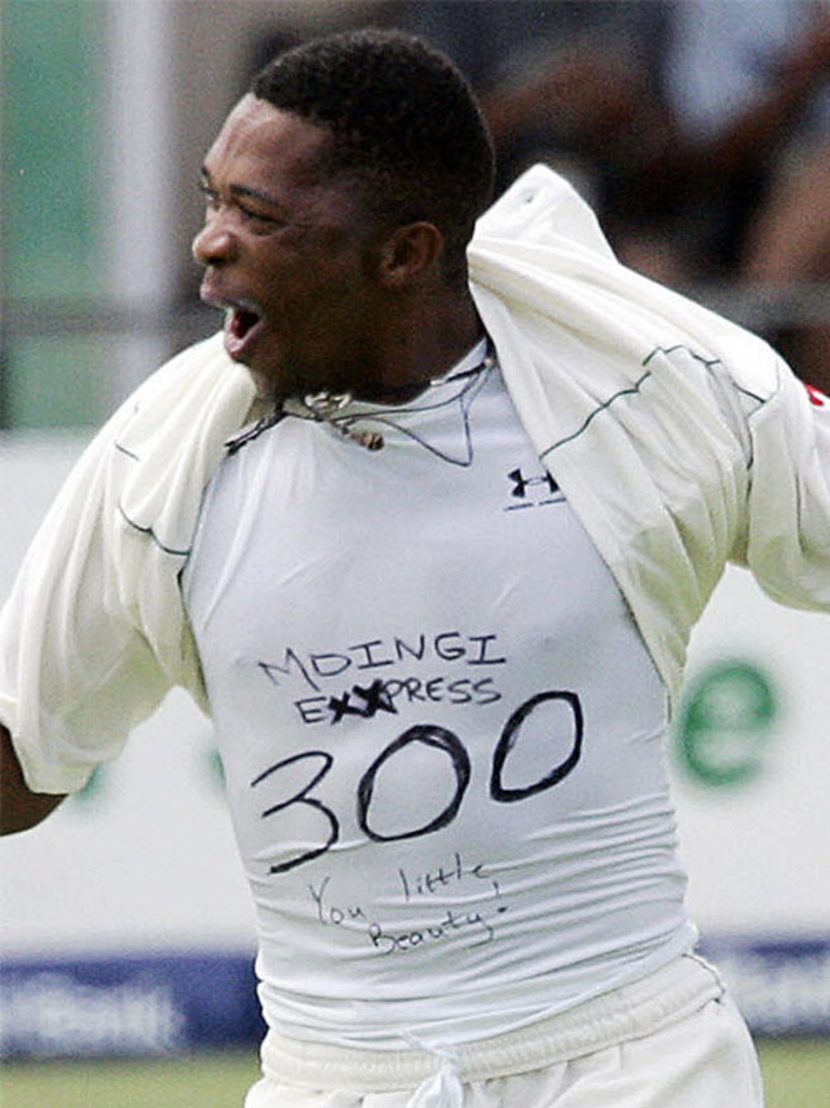 Makhaya Ntini lifts his shirt and celebrates his 300th Test wicket ...