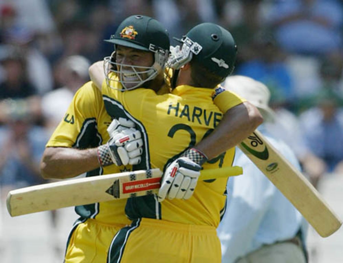 Andrew Symonds salutes the crowd after reaching his century during the ...