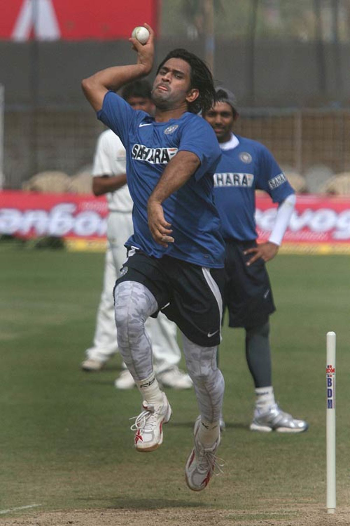 Mahendra Singh Dhoni has a shot at bowling | ESPNcricinfo.com
