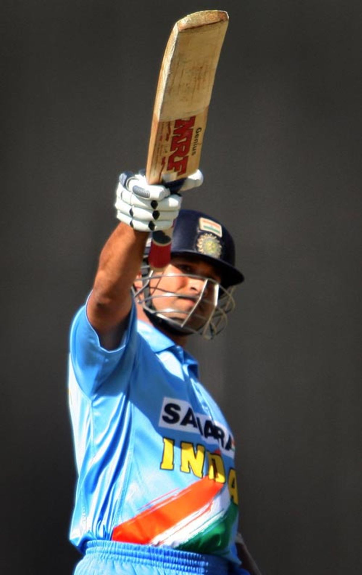 Sachin Tendulkar acknowledges the cheers after getting to his 76th ODI half-century ...