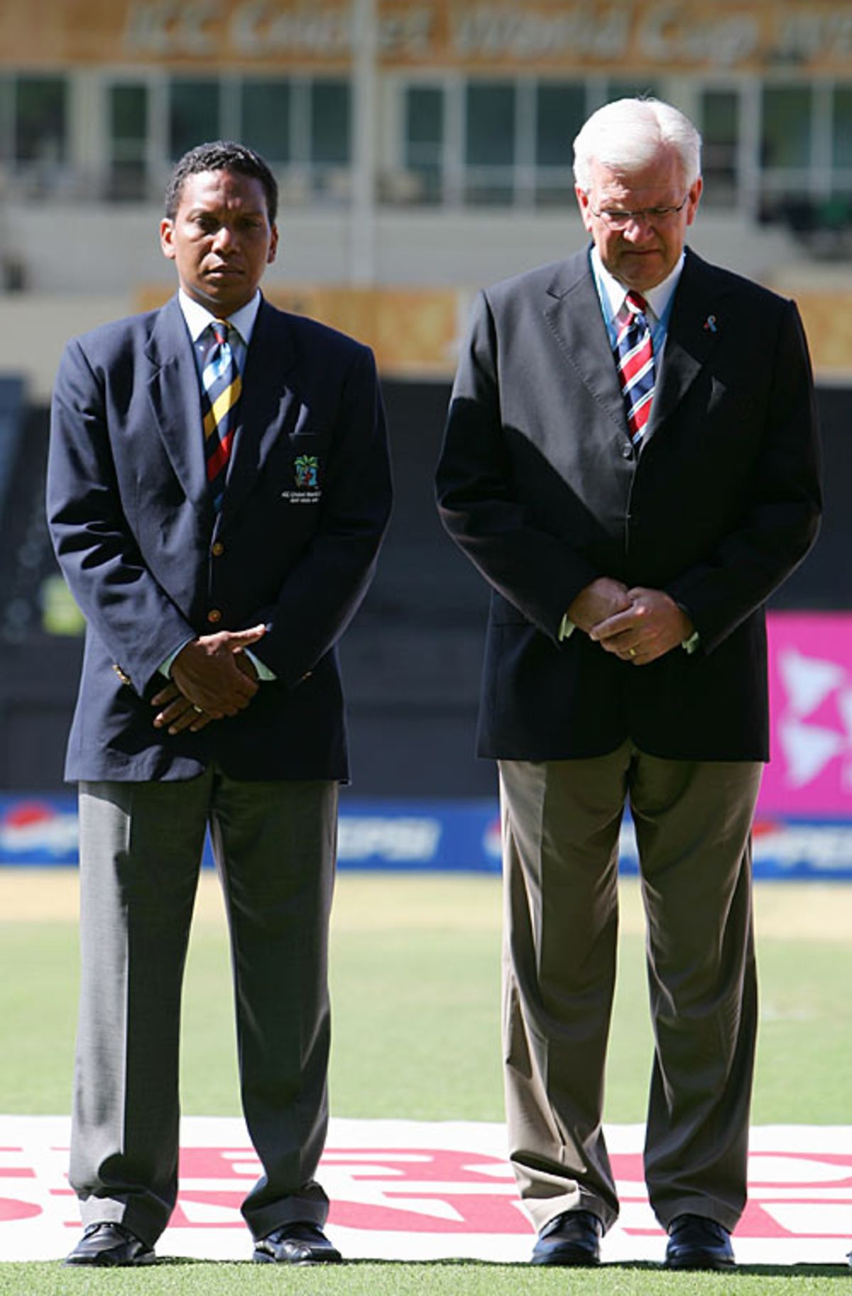 Chris Dehring and Malcolm Speed observe a minute's silence in memory of ...
