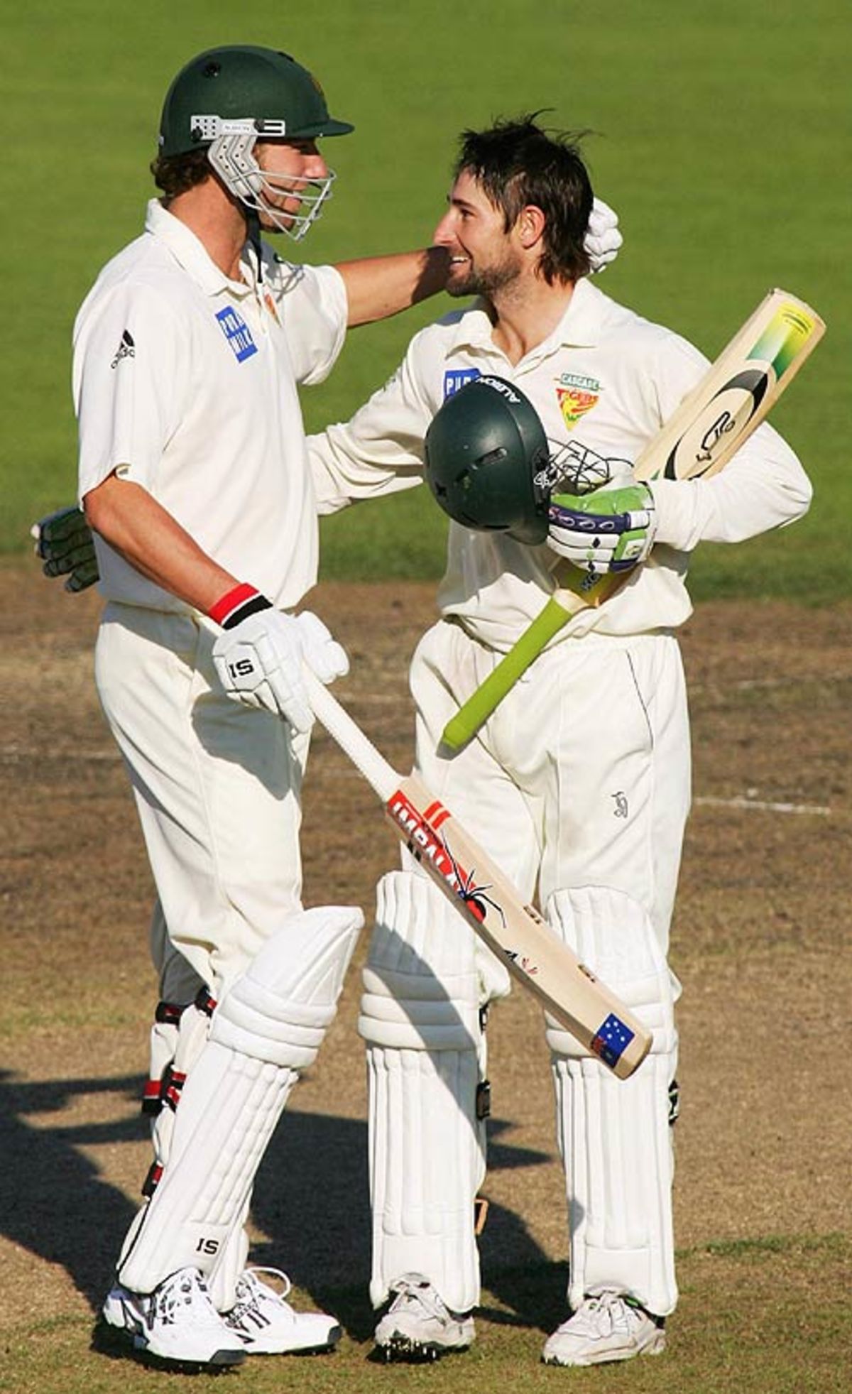 Adam Griffith congratulates Sean Clingeleffer on his century ...