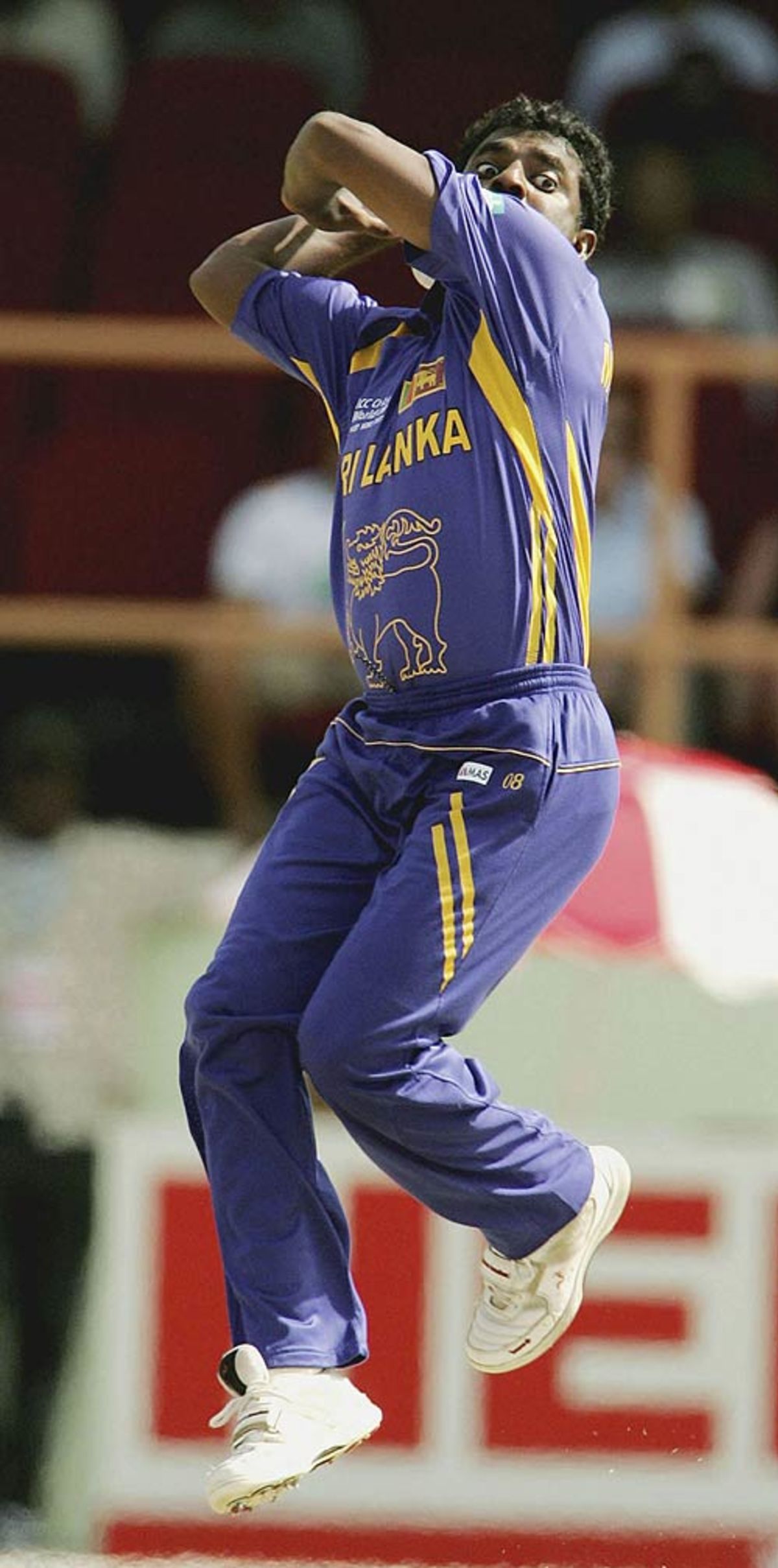 Muttiah Muralitharan bowls on his way to match figures of 3 for 34 ...
