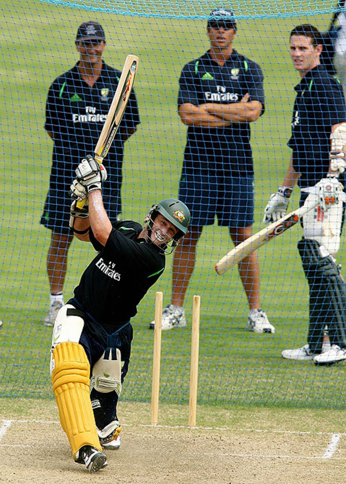 A bunch of hopeful Australians look on as Michael Hussey hits out in ...