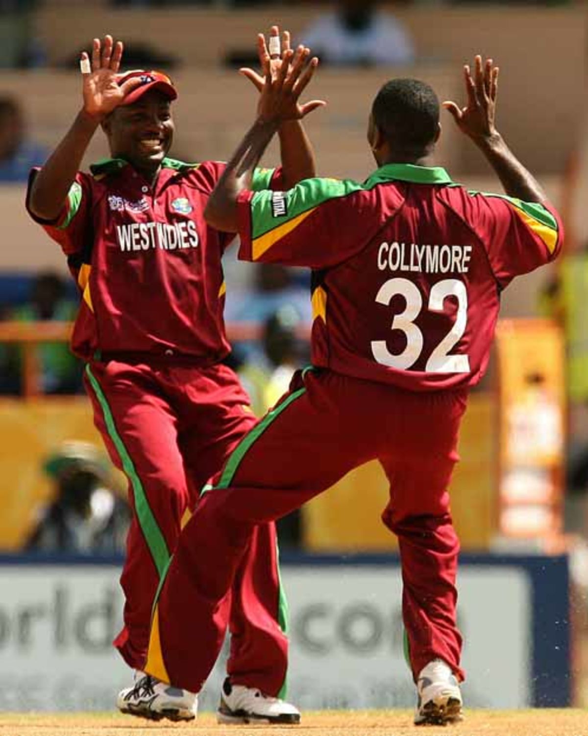 Brian Lara congraulates Corey Collymore on getting the wicket of Graeme ...