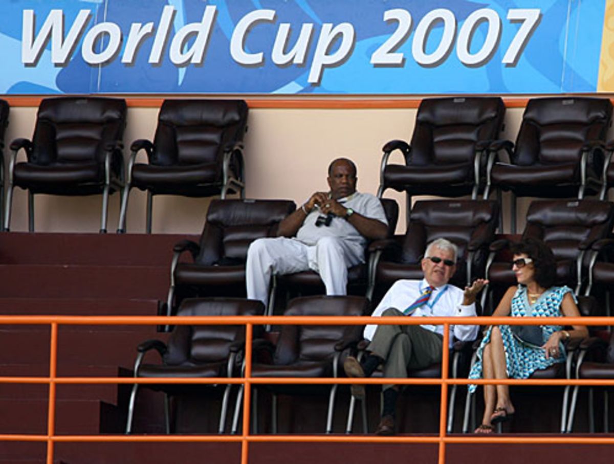 Malcolm Speed sits in a packed stand | ESPNcricinfo.com