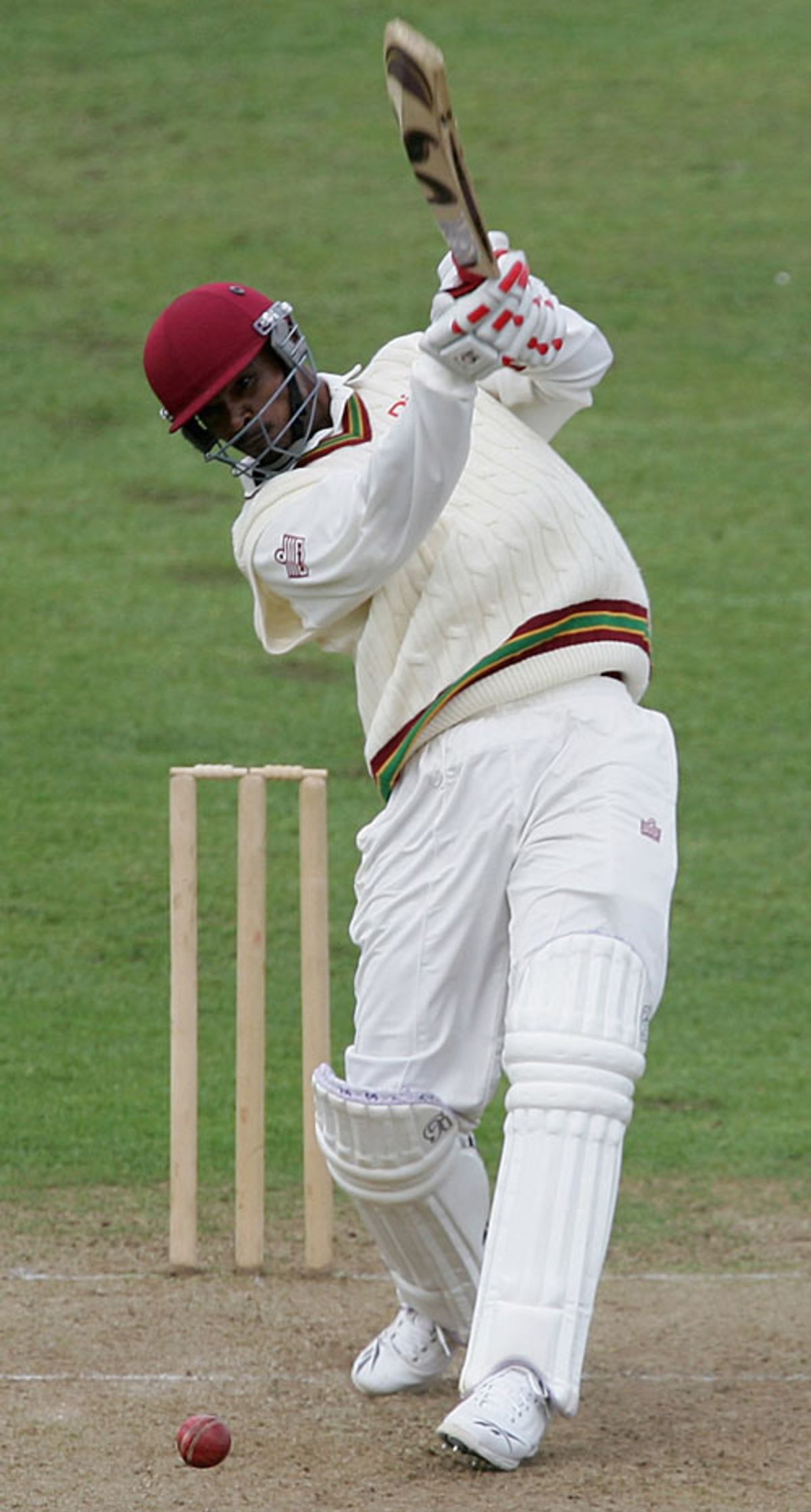 Runako Morton swings through the line and hammers a straight four ...