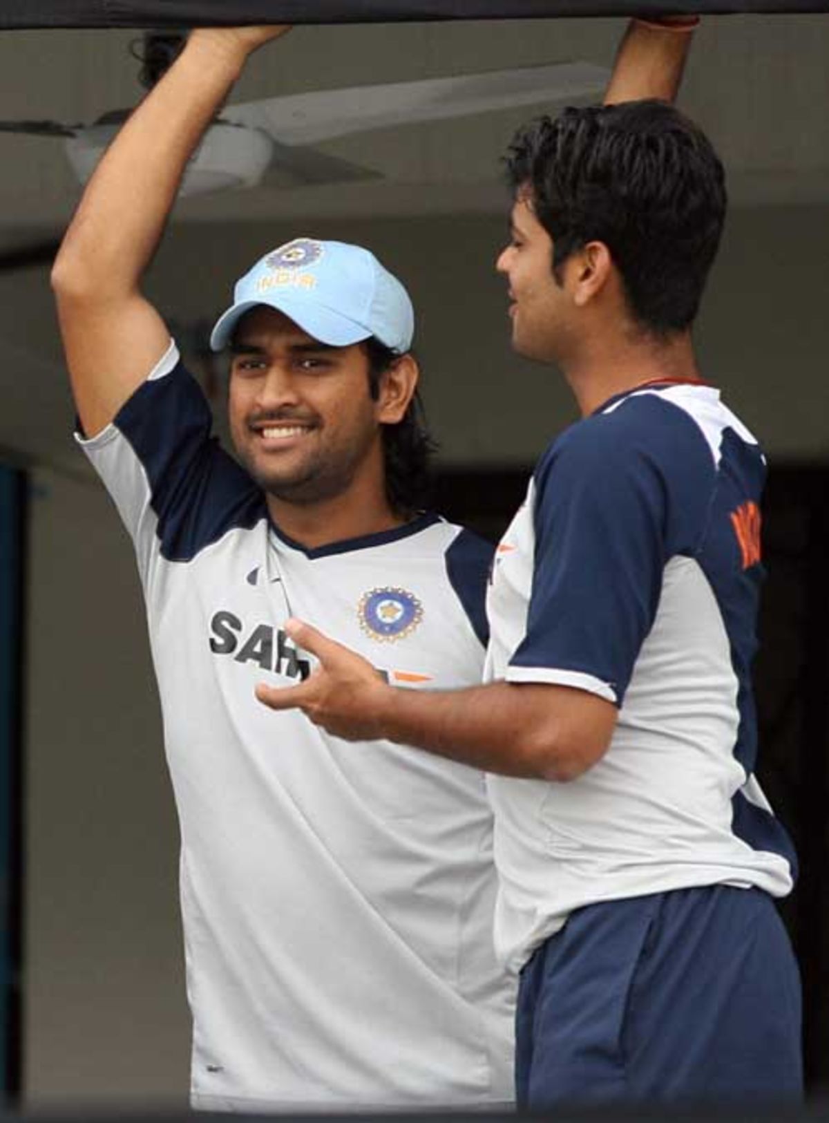 Mahendra Singh Dhoni and RP Singh wait around at India's net practice ...