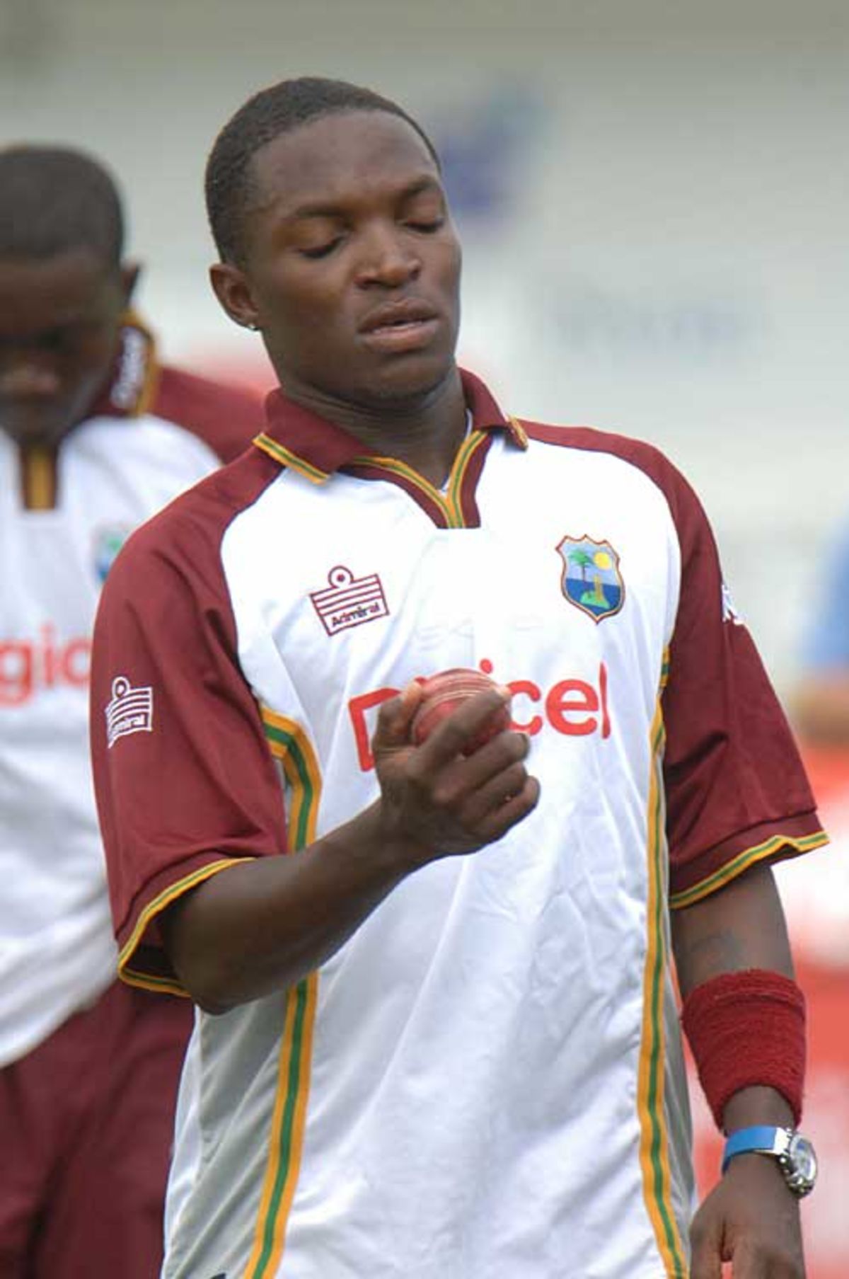 Michael Holding talks with Daren Powell (left) and Jerome Taylor ...
