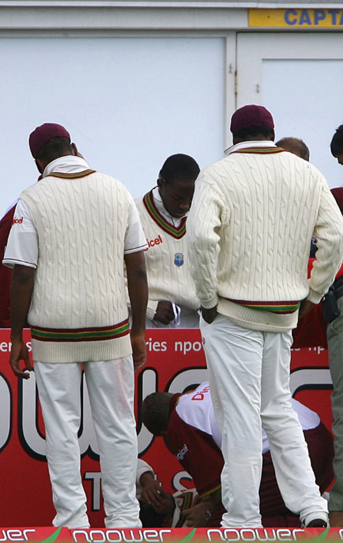 Kevin Pietersen celebrates his hundred as Daren Powell looks on ...