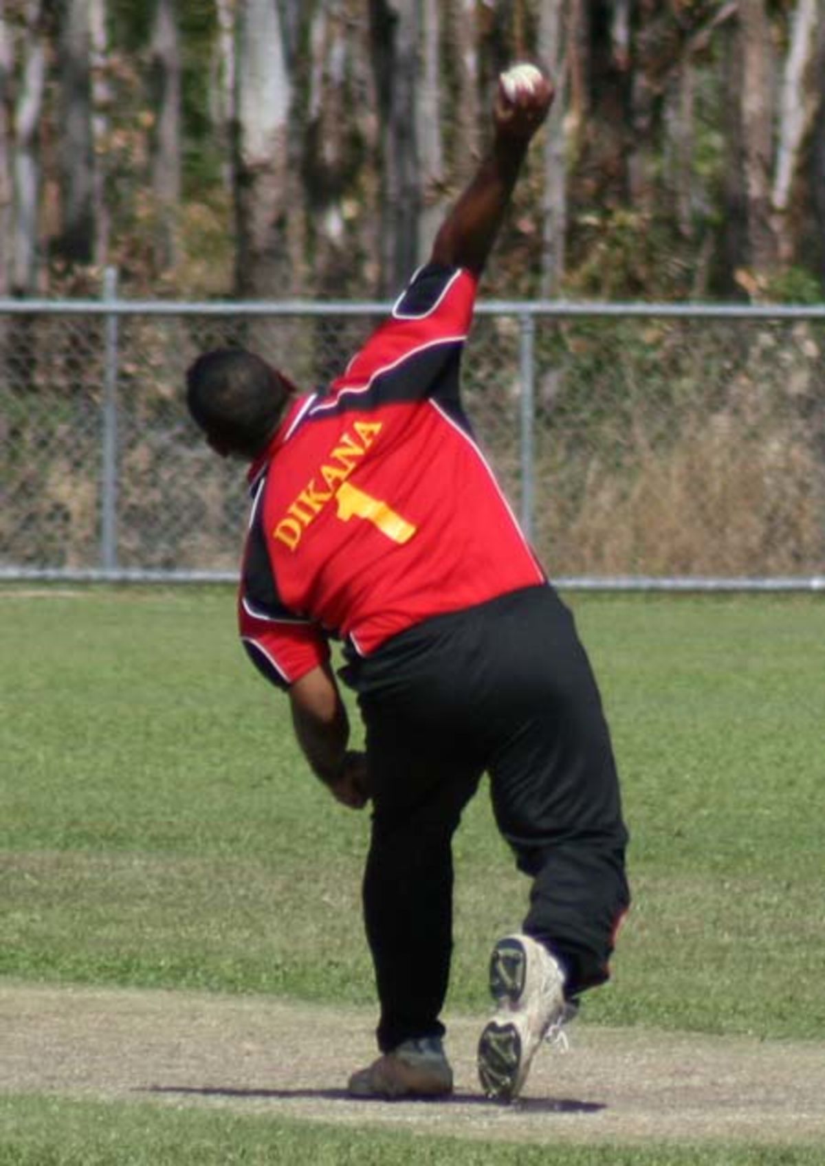 Rarua Dikana bowling against Cayman Islands | ESPNcricinfo.com