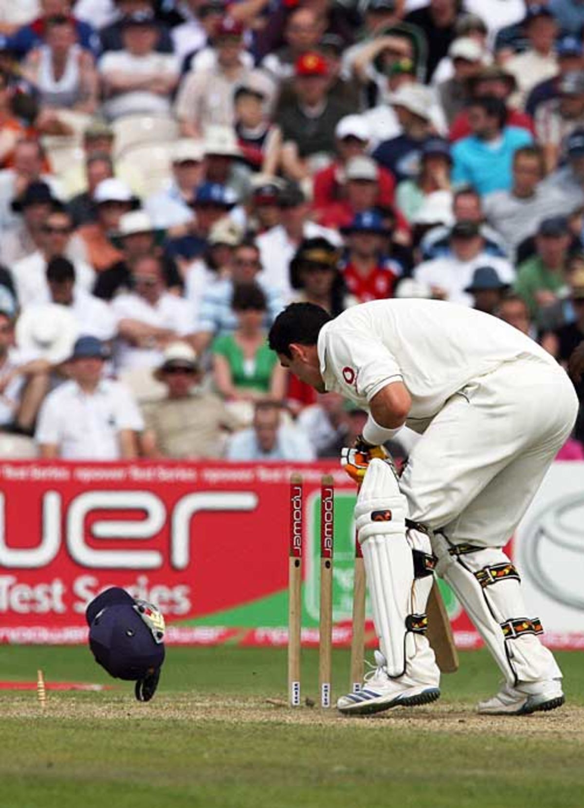 Kevin Pietersen is out hit wicket as his helmet falls onto the stumps ...