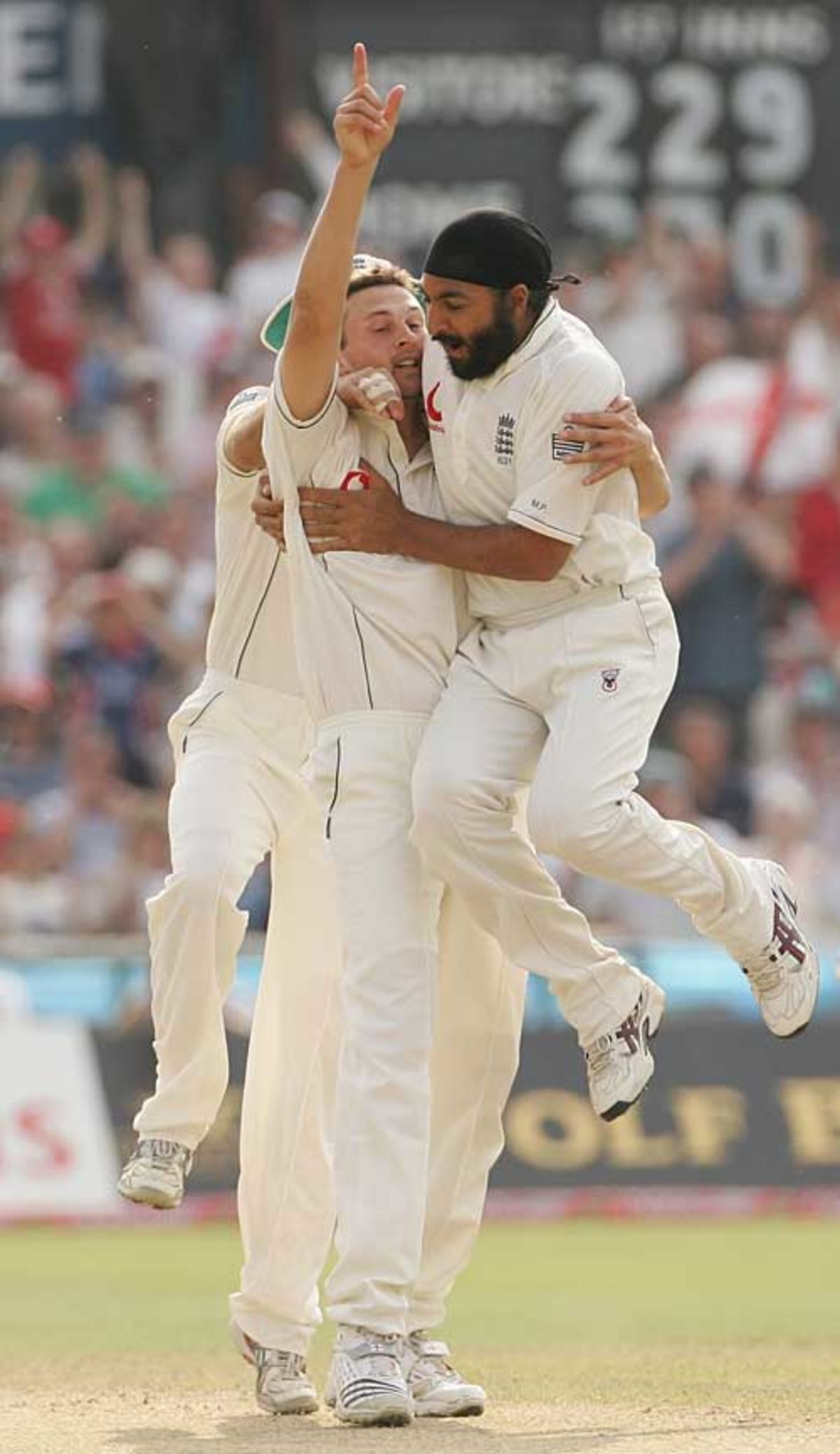 Steve Harmison gets a leaping Monty Panesar after removing Daren Ganga ...